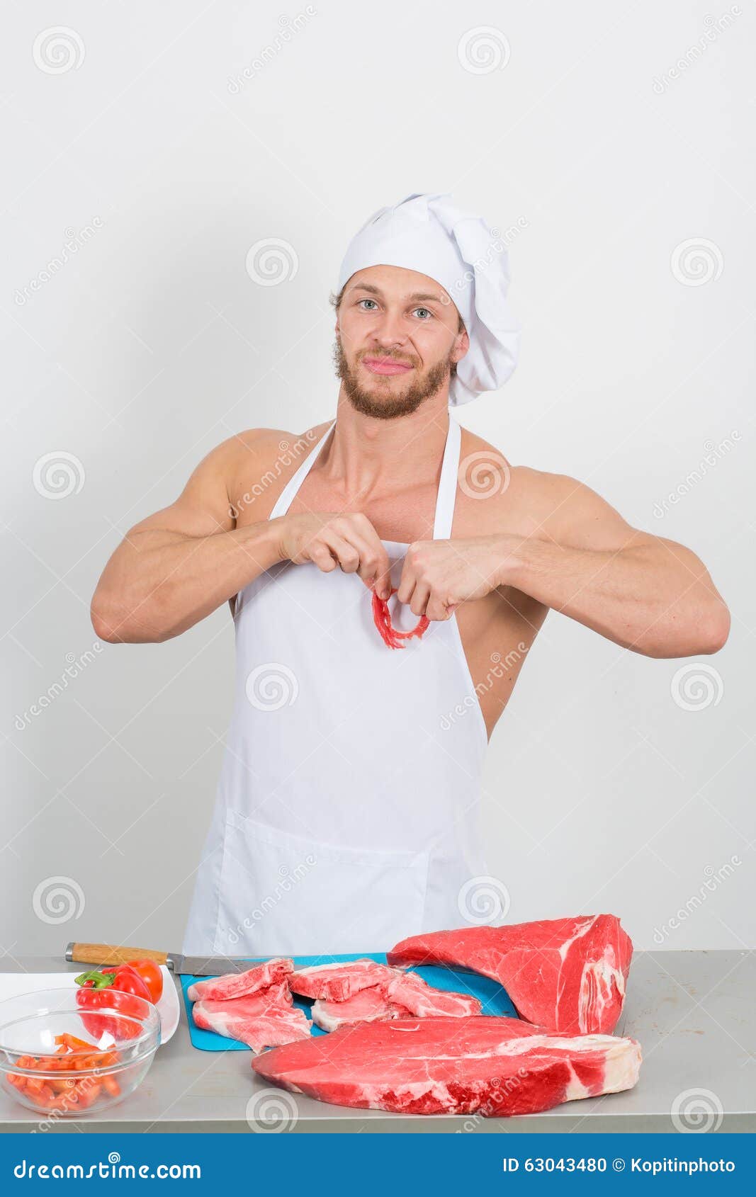 Chef Bodybuilder Preparing Large Chunks Of Raw Meat. Natural Proteins ...