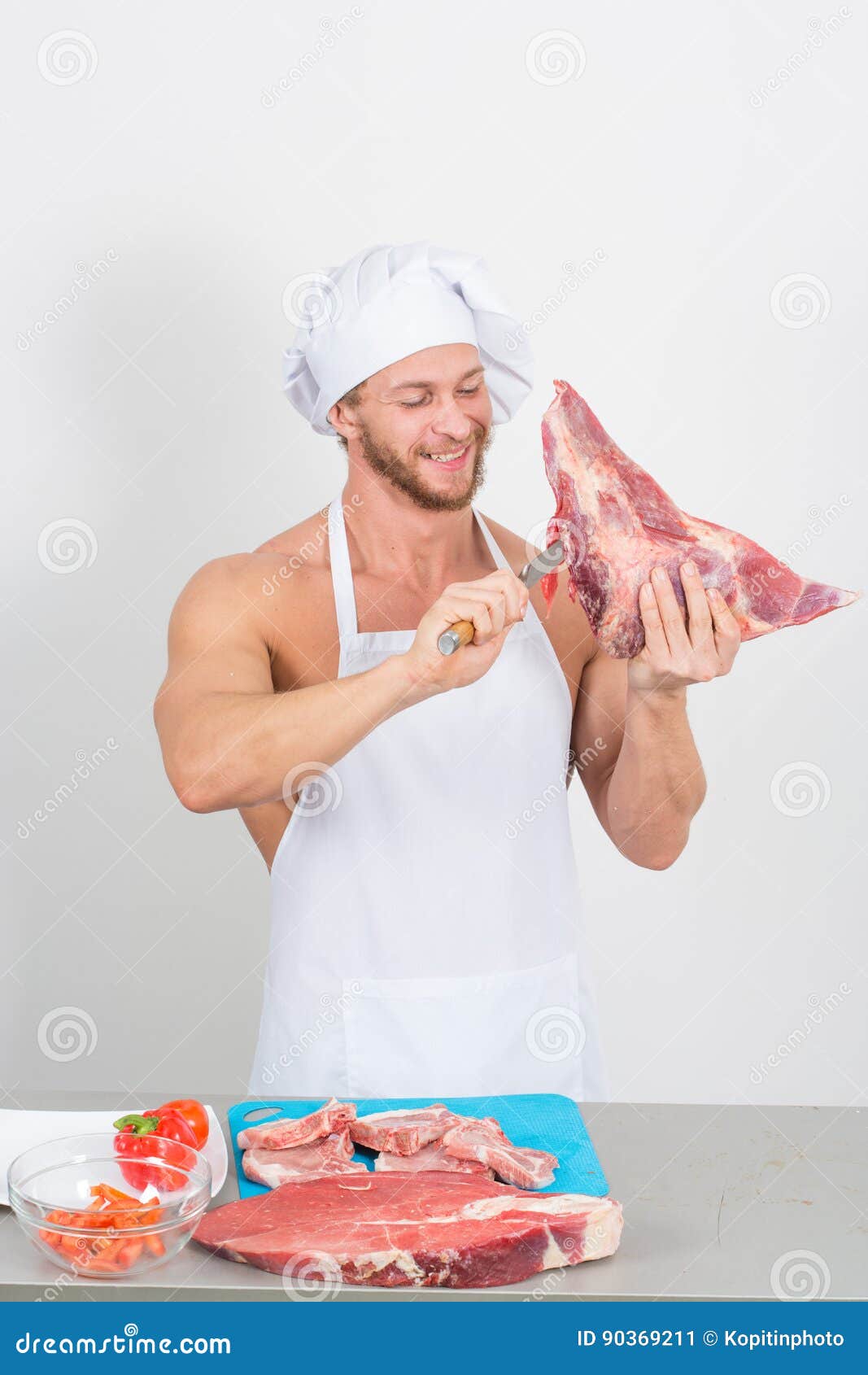 Chef Bodybuilder Preparing Large Chunks Of Raw Meat. Natural Proteins ...