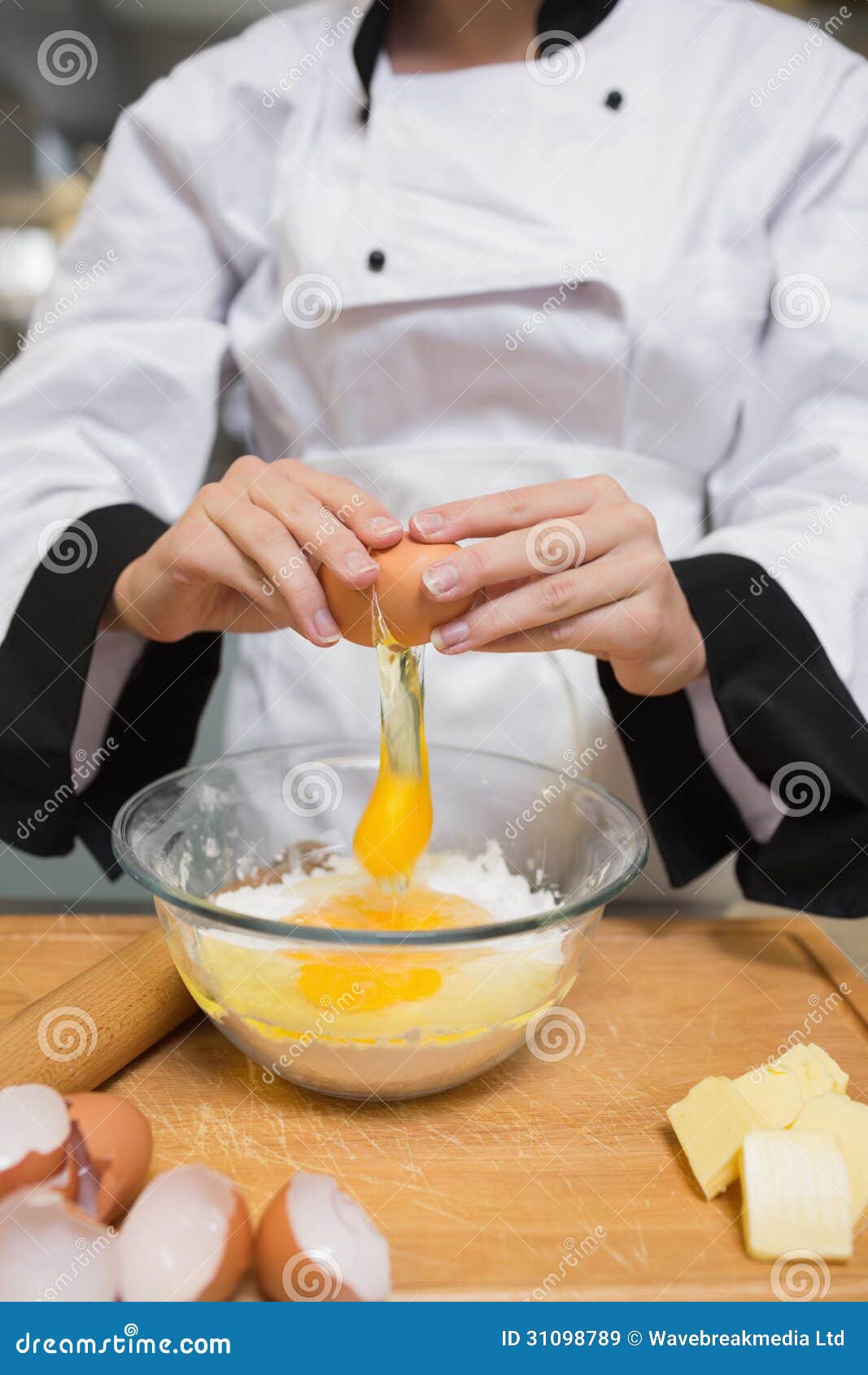 Chef Breaking Eggs into Flour Stock Image - Image of making, holding ...