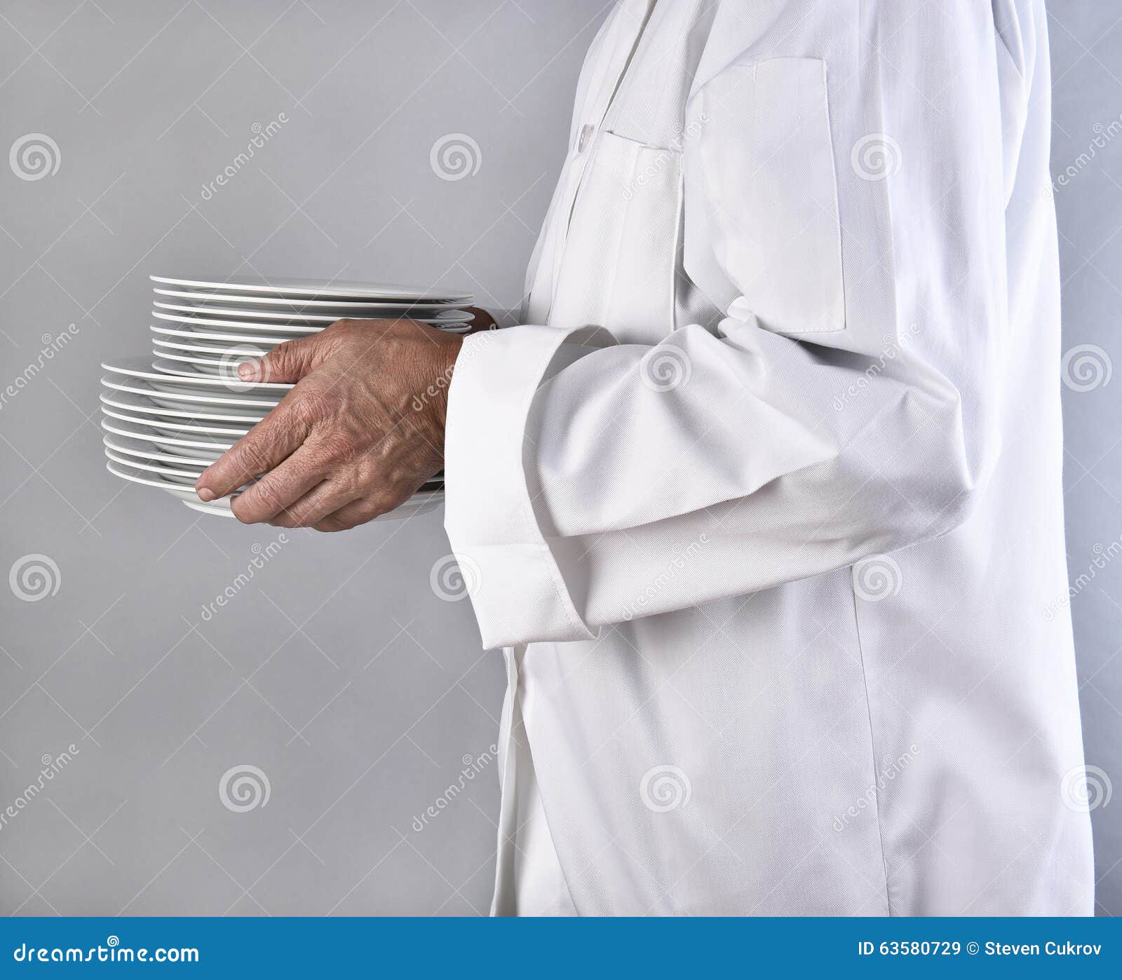 Chef Carrying Plates stock image. Image of plates, monochromatic - 63580729