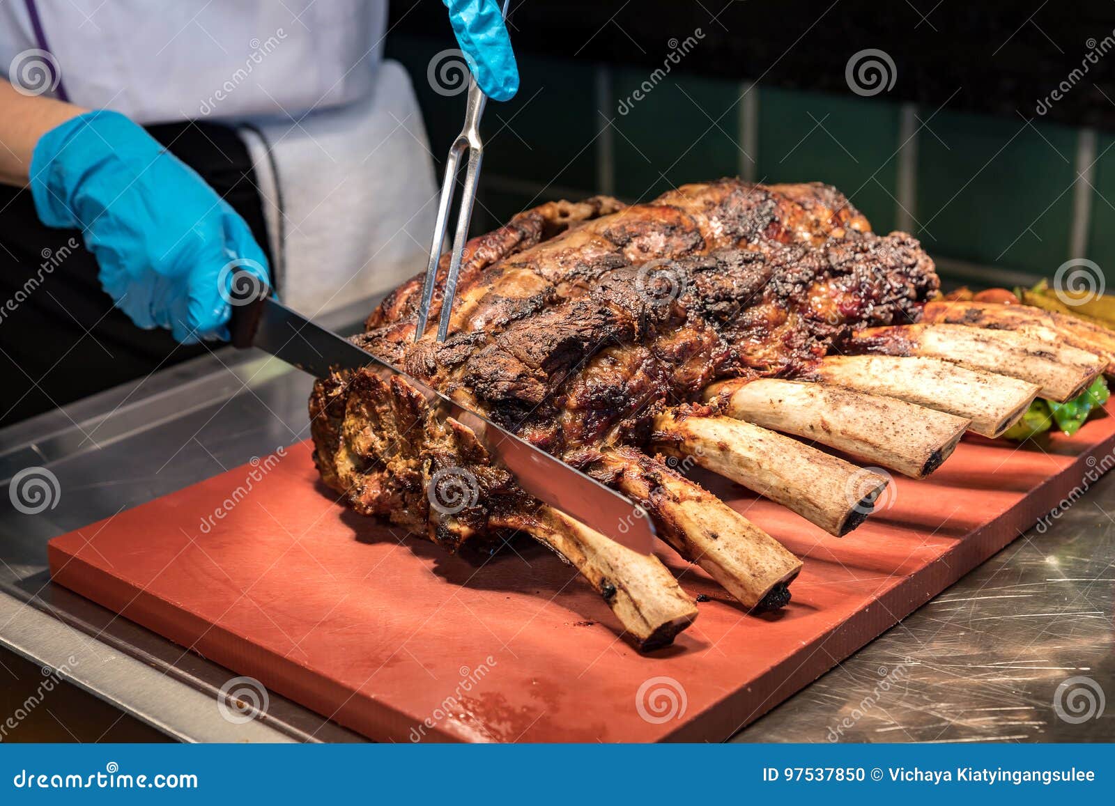 Chef carving beef stock photo. Image of lunch, festivities - 97537850