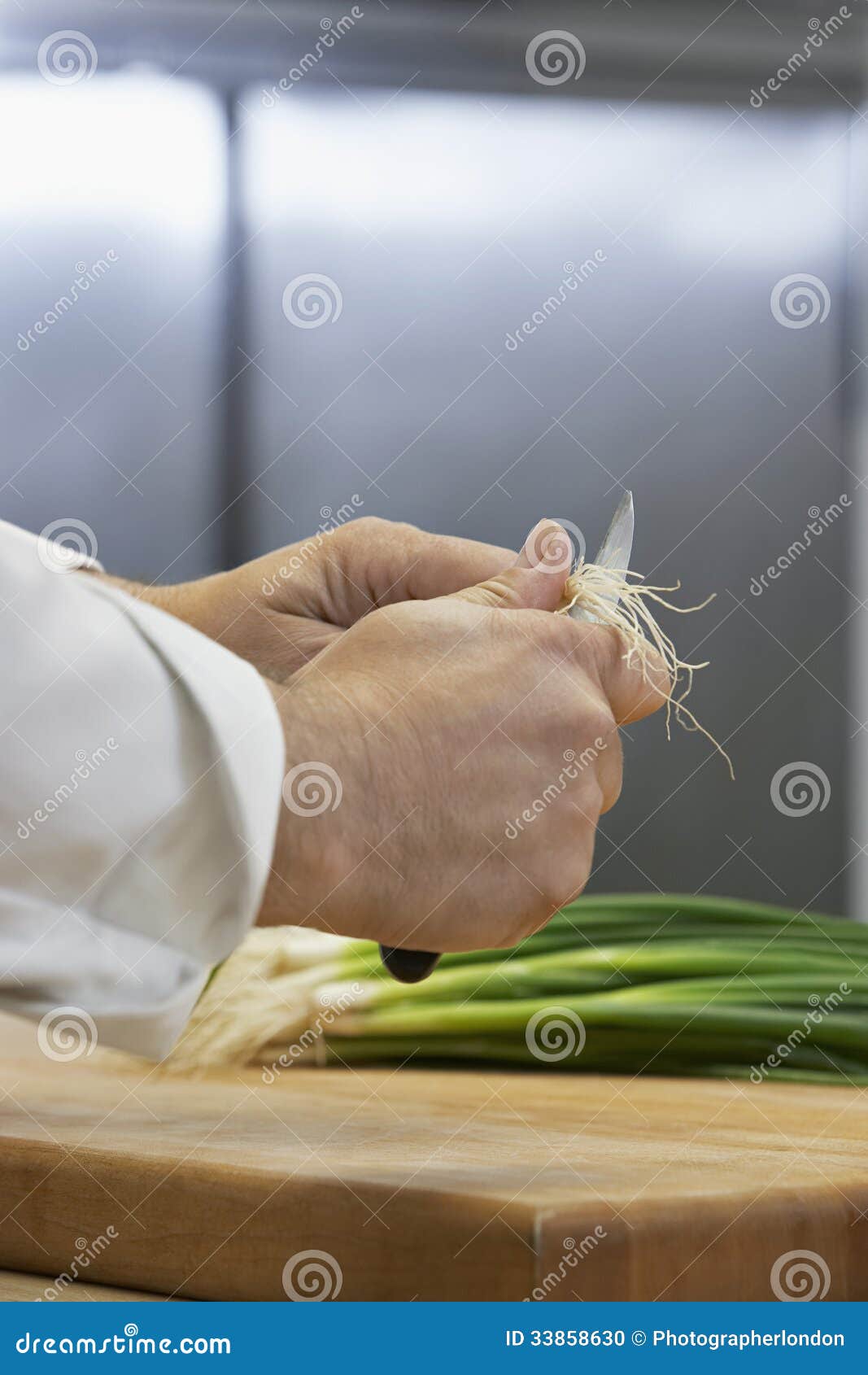 Chef Chopping Garlic On A Cutting Table Stock Image | CartoonDealer.com ...