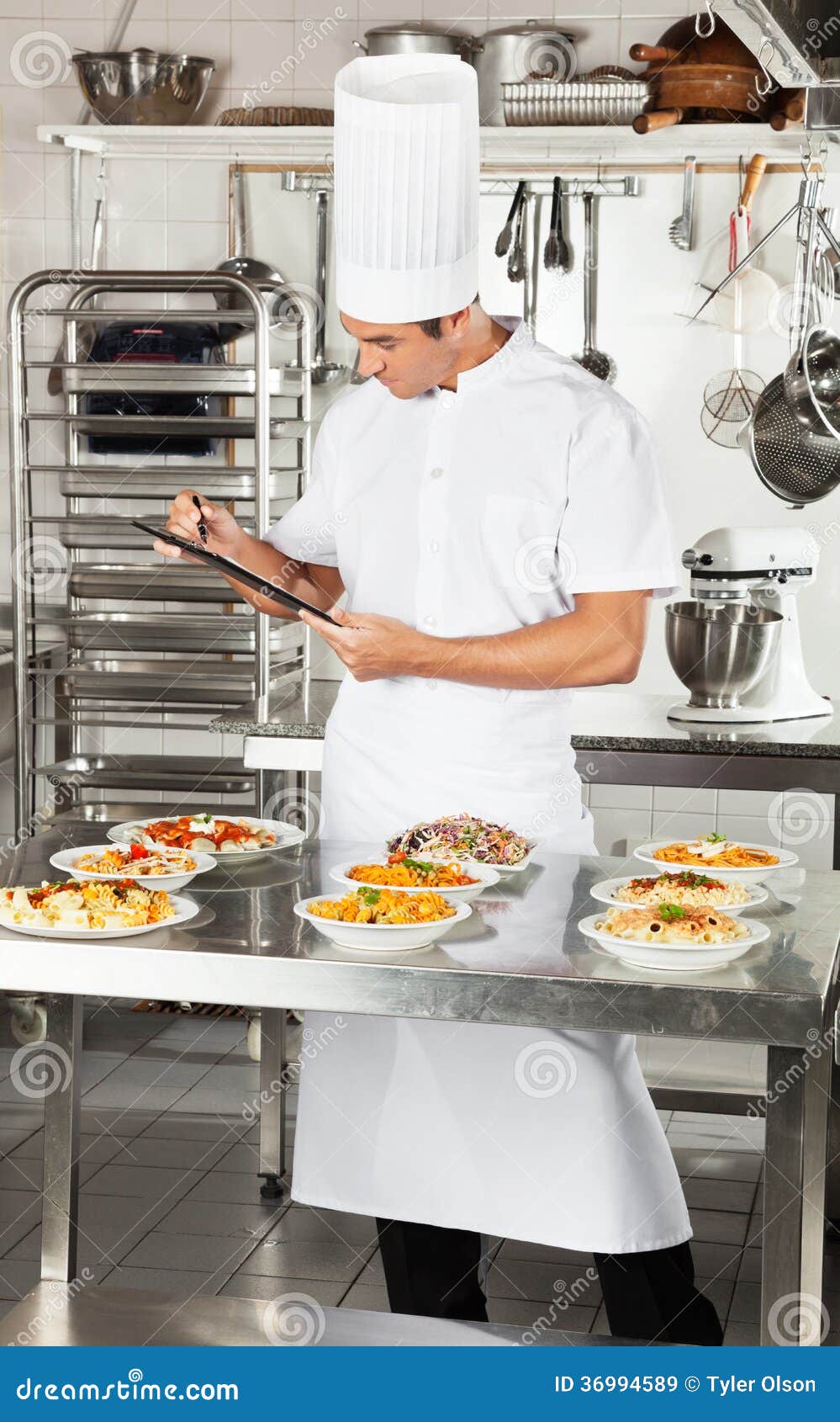 Chef with Clipboard Checking Pasta Dishes Stock Image - Image of chef ...