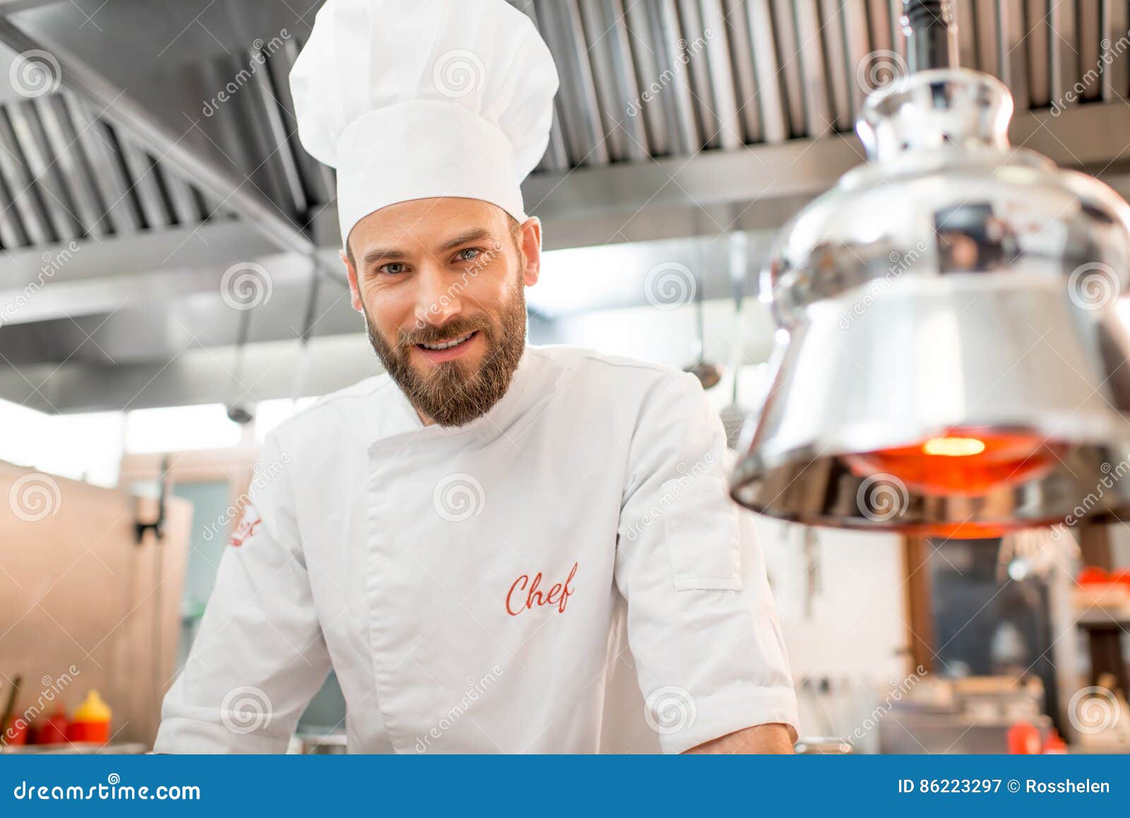 Chef cook at the kitchen stock image. Image of handsome - 86223297