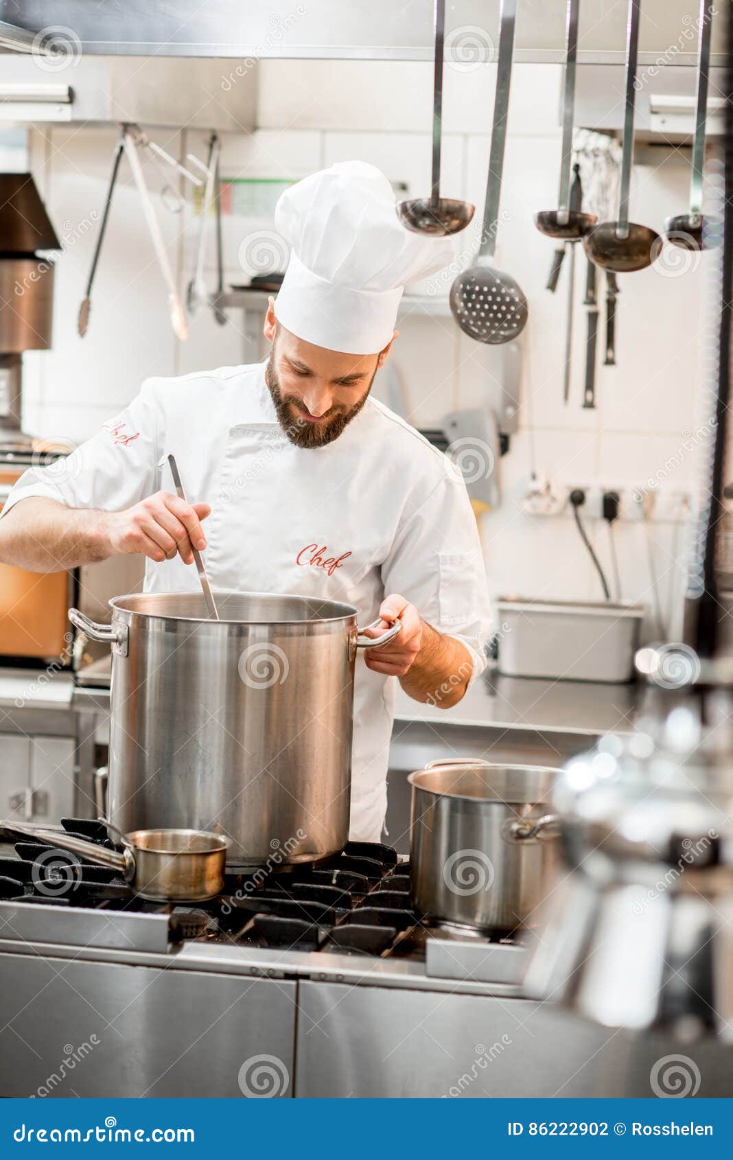 Chef cook at the kitchen stock photo. Image of scoop - 86222902