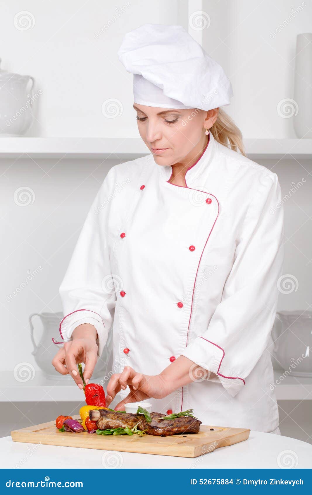 Chef-cook presenting meals stock photo. Image of closeup - 52675884