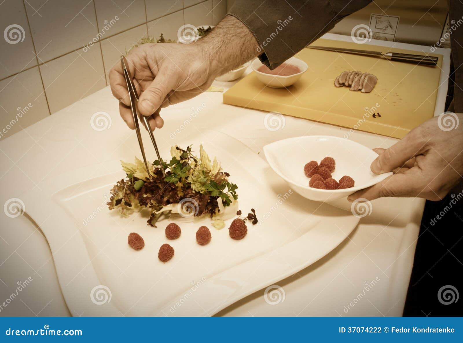 Chef is cooking appetizer stock photo. Image of cooked - 37074222