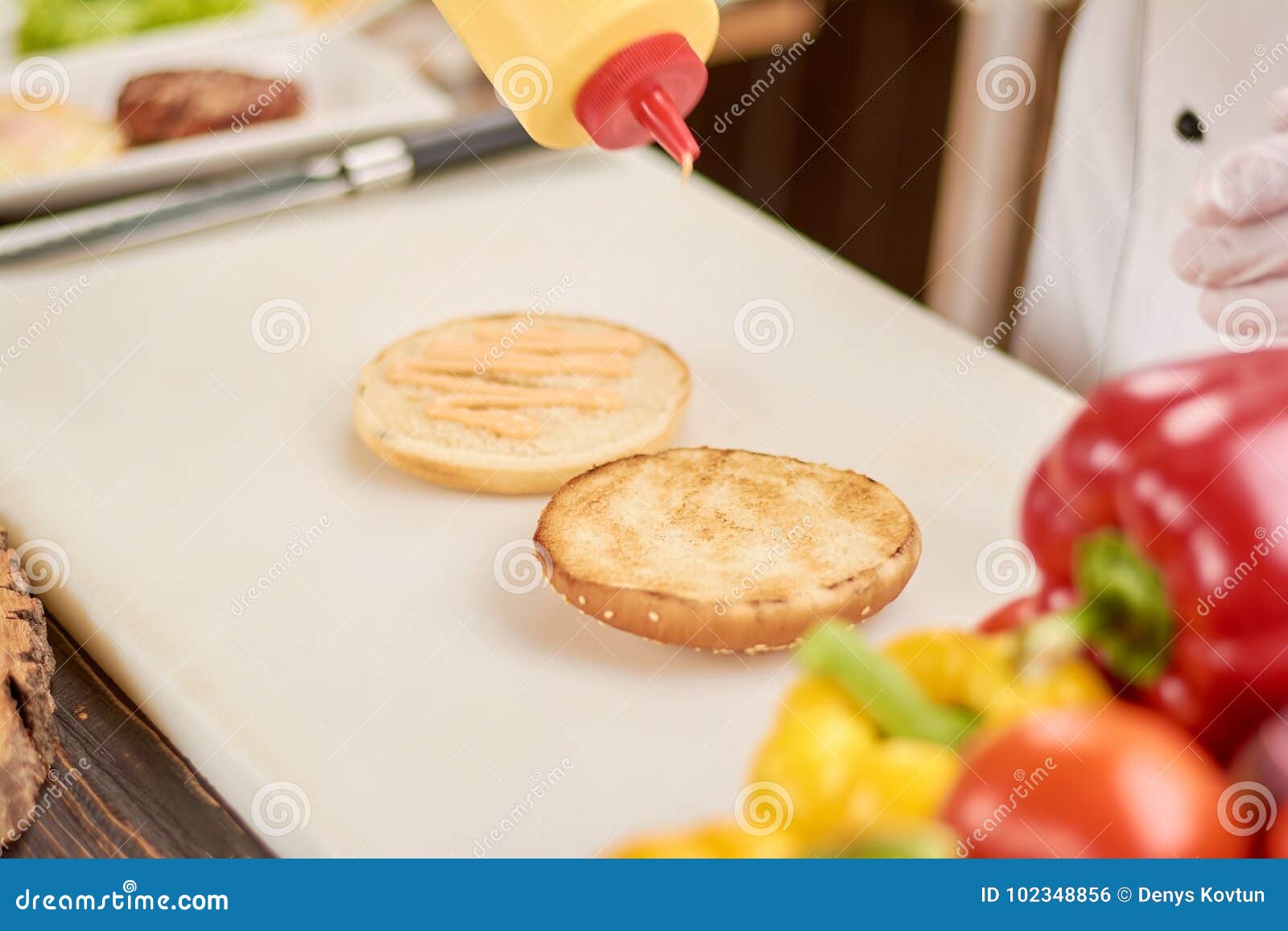 Chef Cooking Burger at Kitchen. Stock Photo - Image of cuisine, burger ...