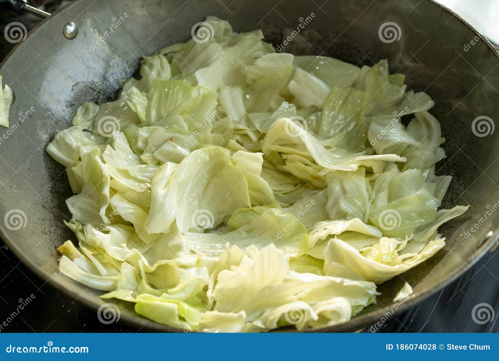 A chef is cooking cabbage stock photo. Image of delicious - 186074028