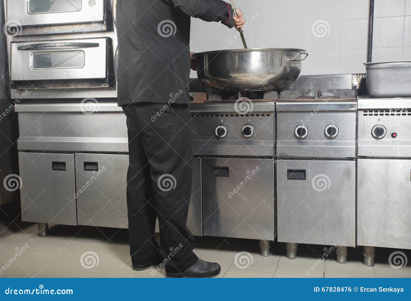 Chef Cooking at Commercial Kitchen Stock Photo - Image of cook ...