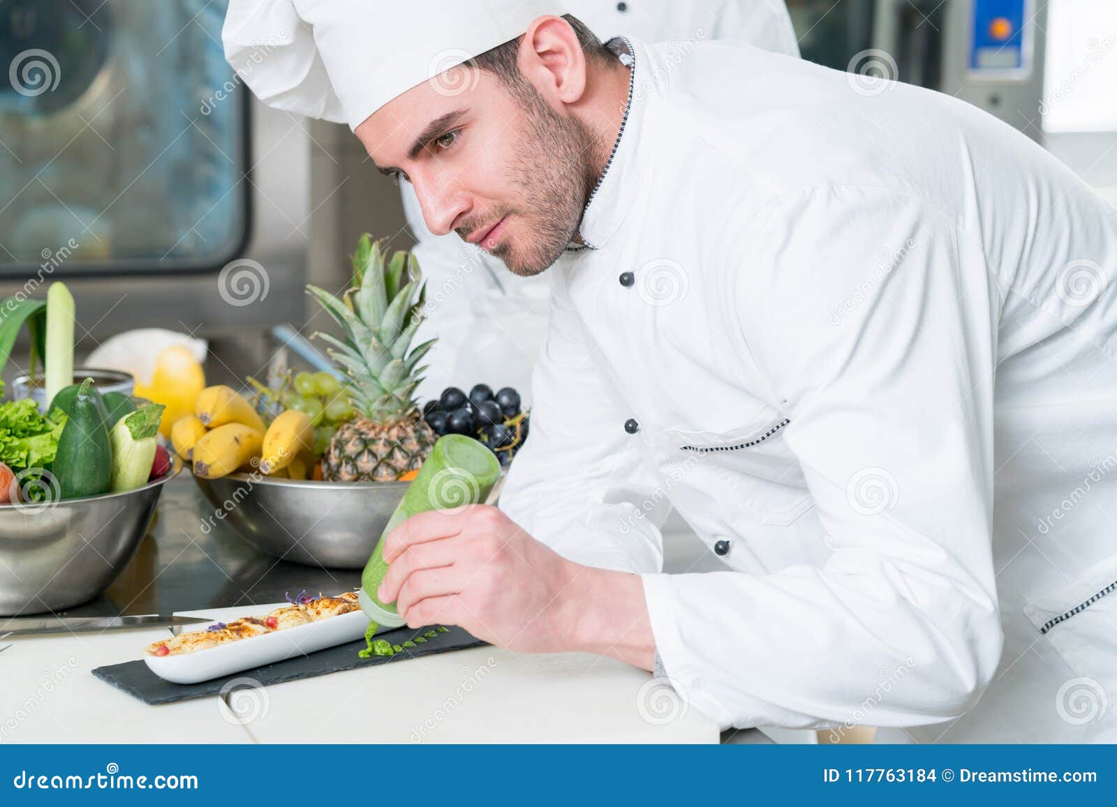 Young Chef Preparing Meal in Kitchen Stock Photo - Image of herb ...