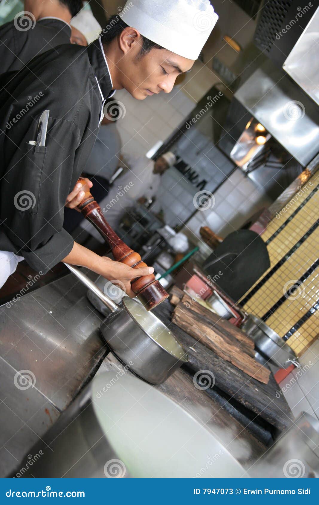 Chef cooking at dinner stock image. Image of skillful - 7947073