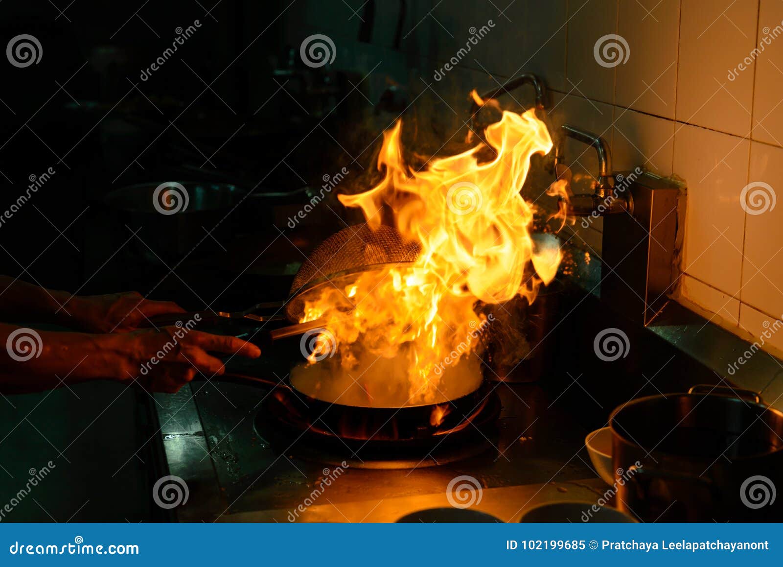 Chef Cooking and Doing Flambe on Food in Kitchen Stock Image - Image of ...