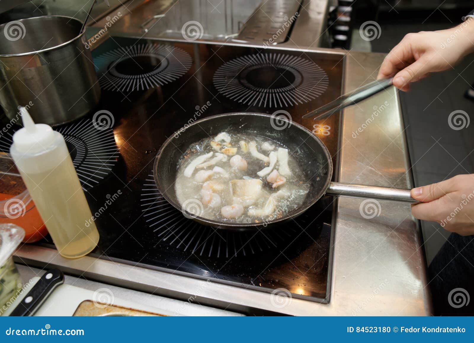 Chef is Cooking Fish in Boiling Stock Stock Photo - Image of catering ...