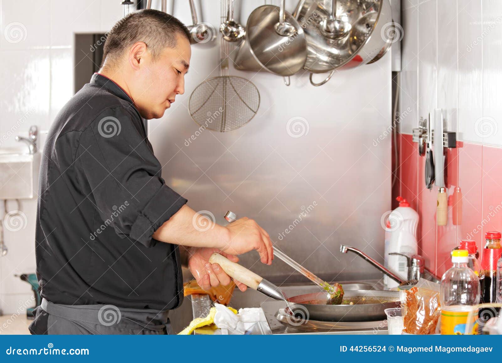 Chef Cooking Food in Wok Pan Stock Photo - Image of adult, cuisine ...