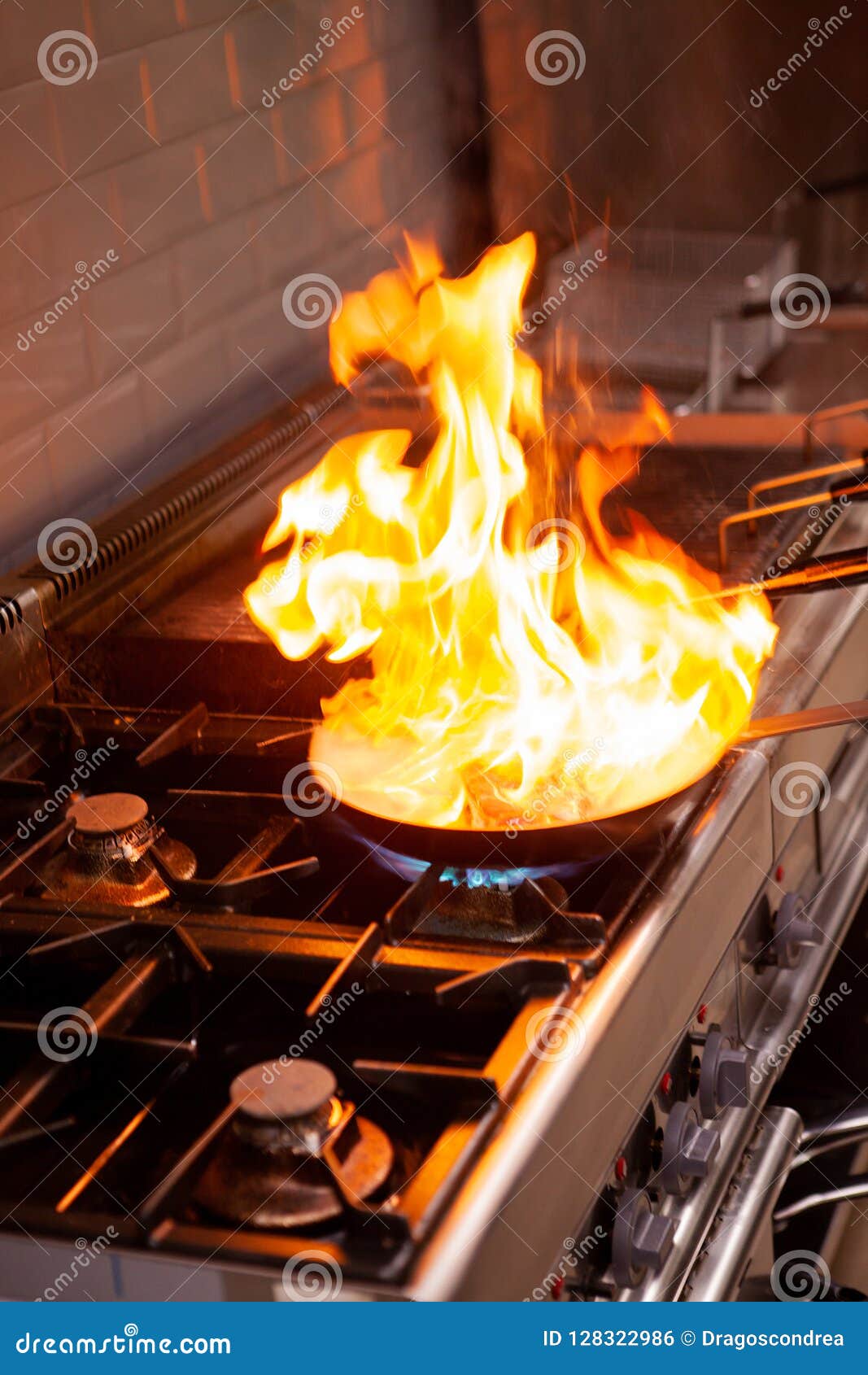 Chef Cooking with High Fire in Kitchen Stock Photo - Image of ...
