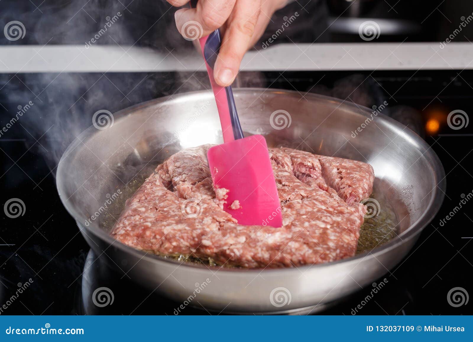 Chef cooking minced meat stock image. Image of frying - 132037109