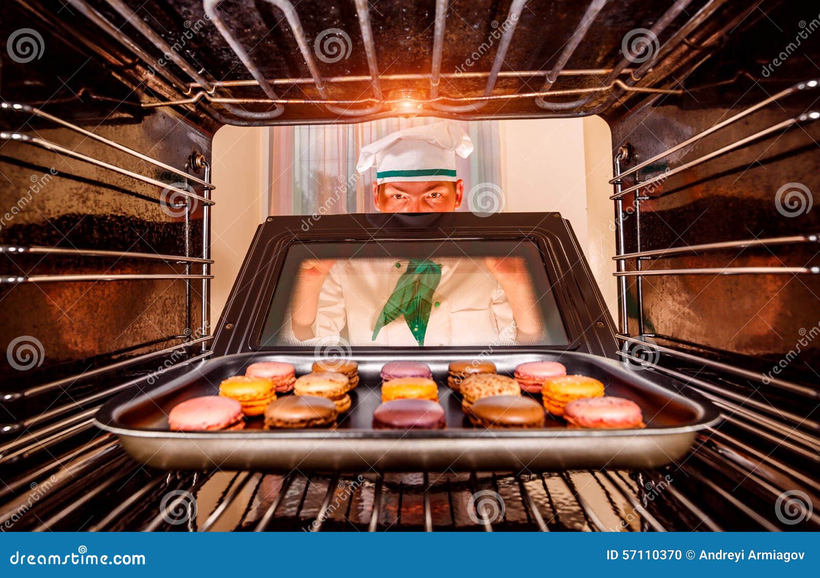 Chef cooking in the oven. stock photo. Image of hold - 57110370