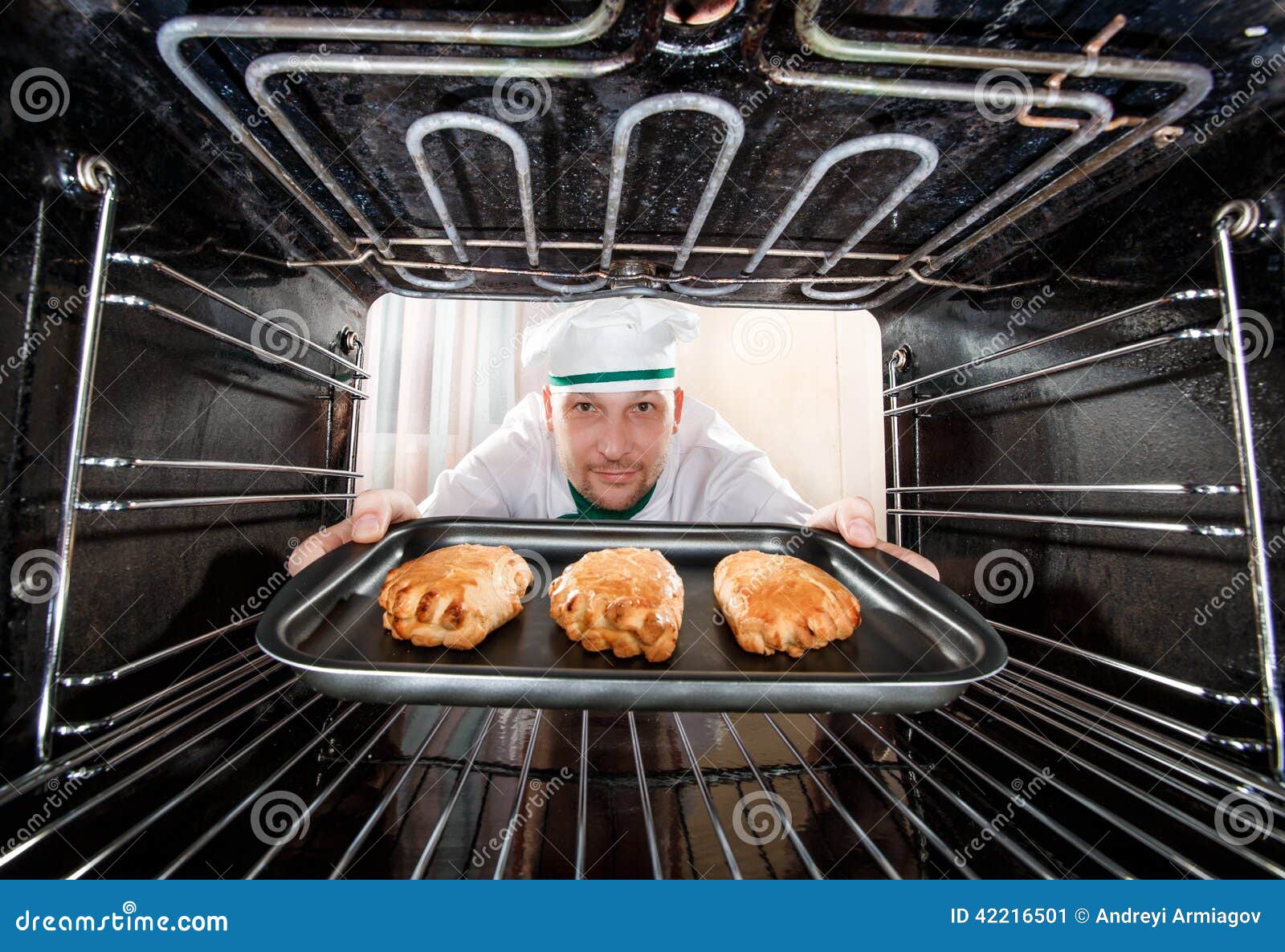 Chef cooking in the oven. stock image. Image of food - 42216501