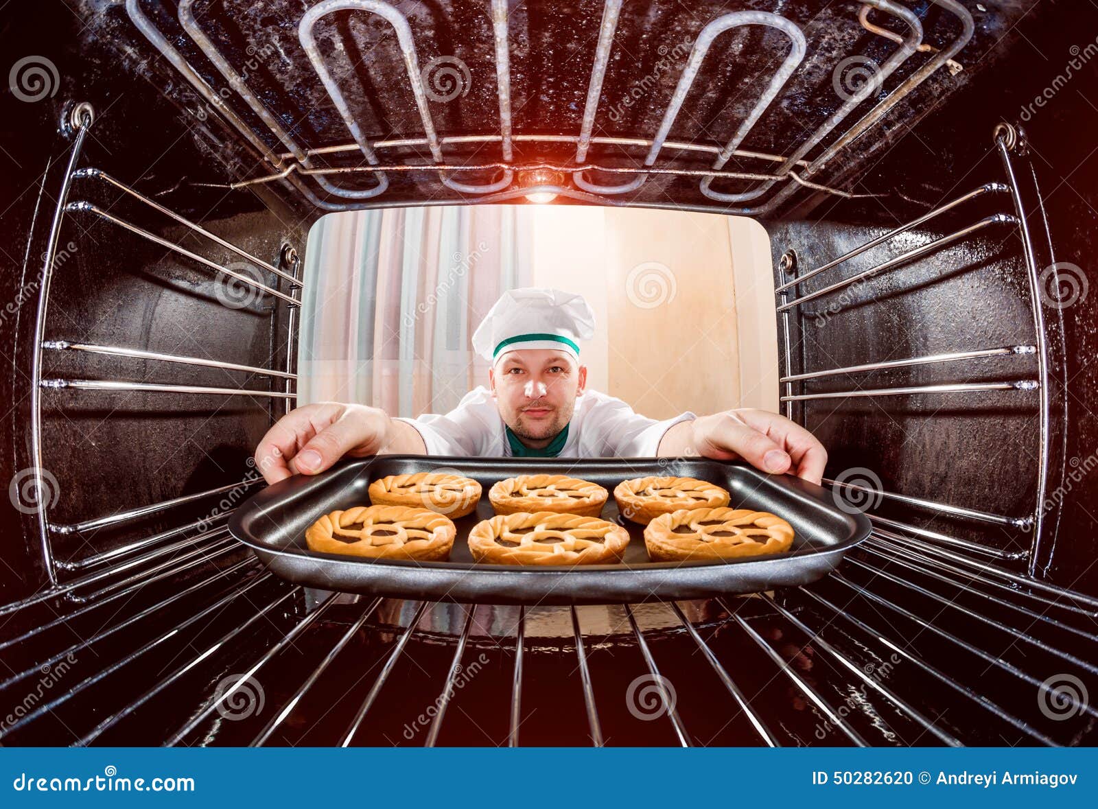 Chef cooking in the oven. stock photo. Image of bath - 50282620