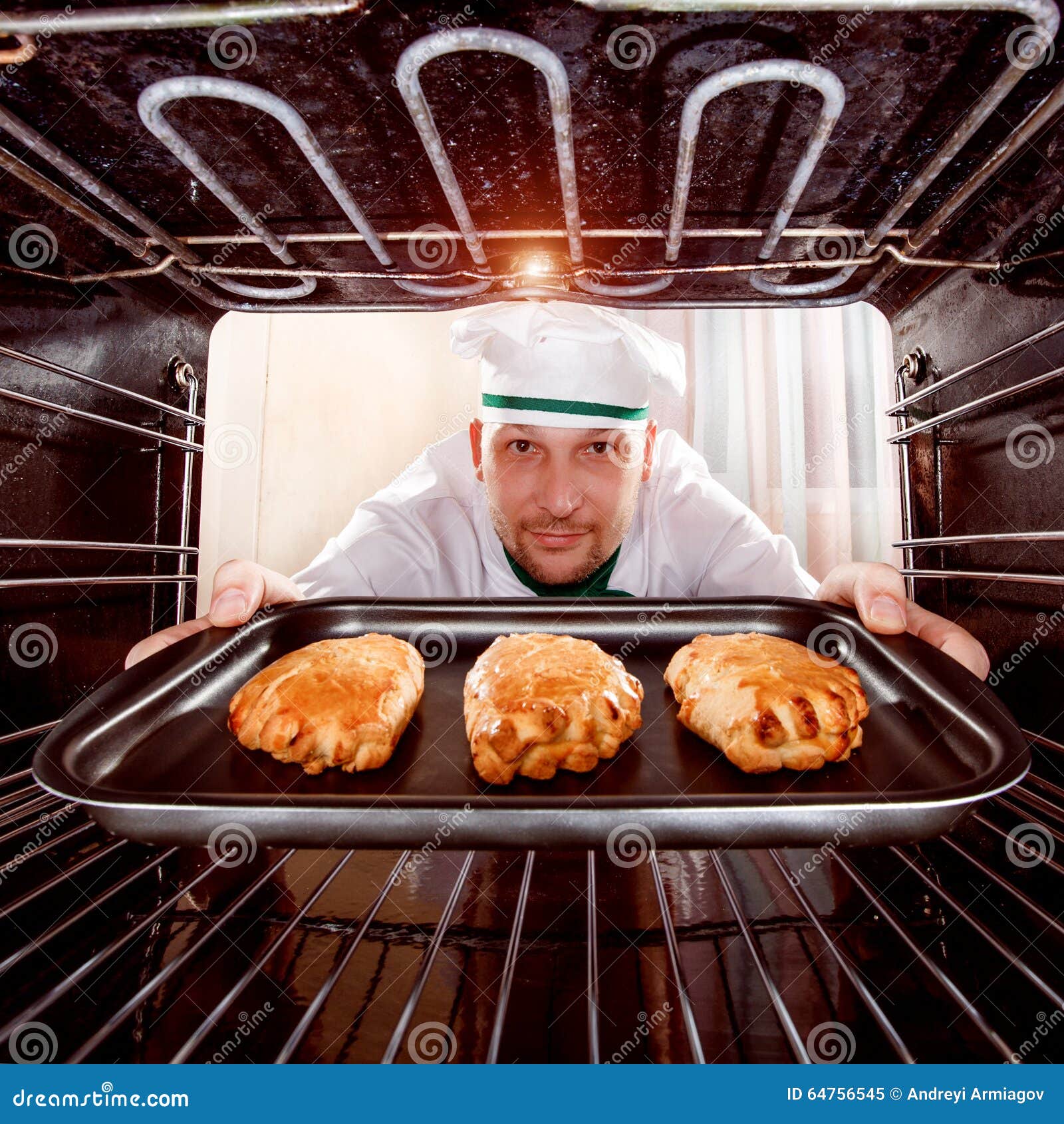 Chef cooking in the oven. stock image. Image of chef - 64756545