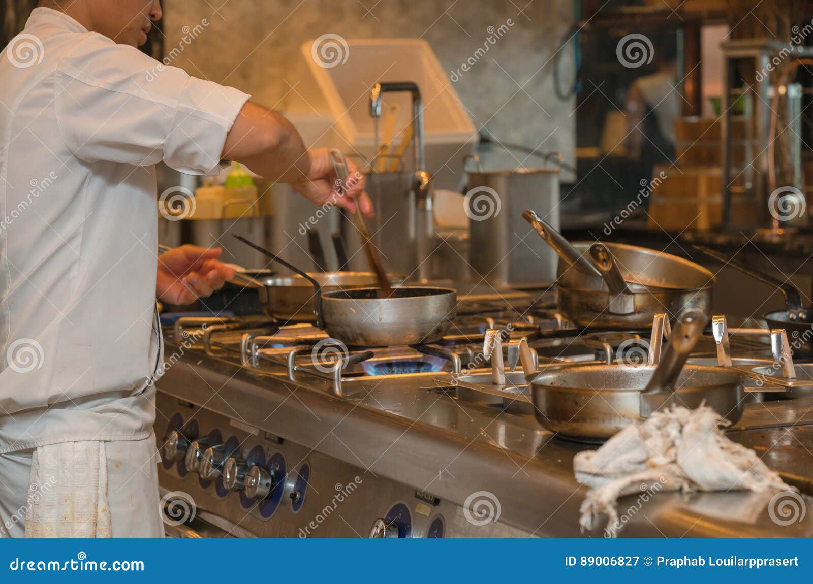 Chef Cooking with Pan in the Kitchen Editorial Photography - Image of ...