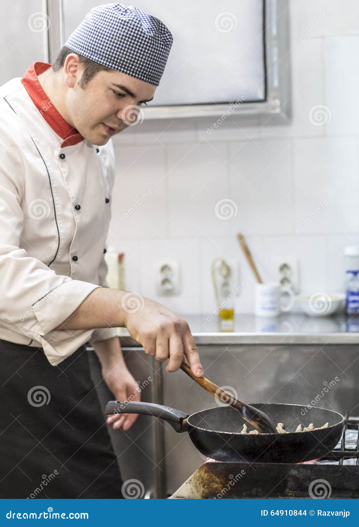 Chef Cooking Pasta stock photo. Image of spoon, meal - 64910844