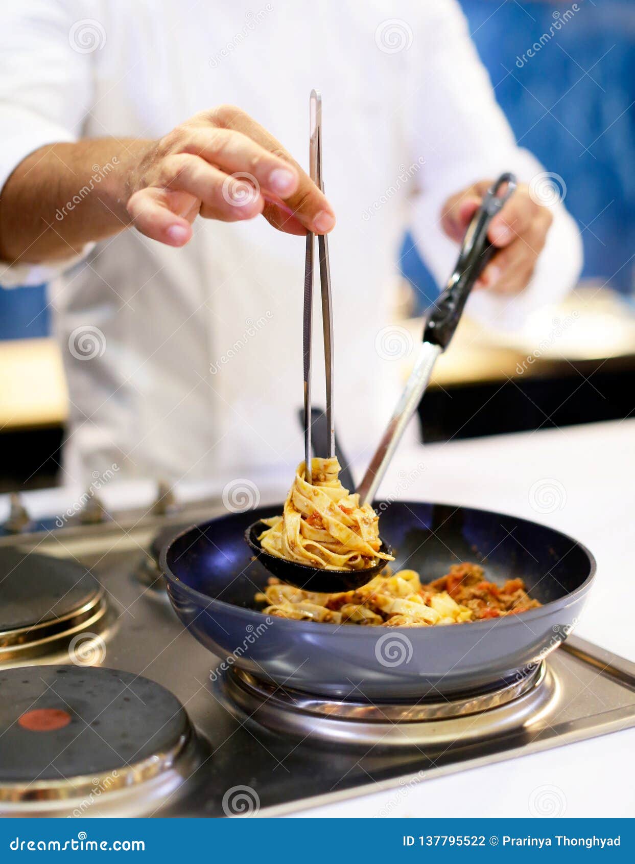 Chef Cooking Pasta, Chef Serves Spaghetti Carbonara on the Plate in the ...