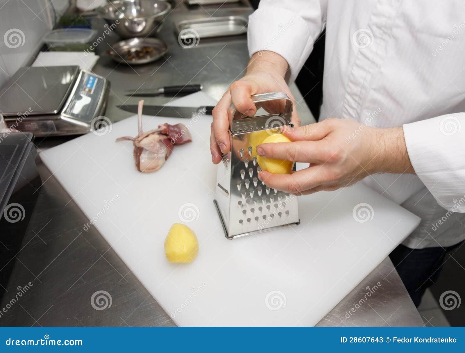 Chef is cooking potatoes stock image. Image of chef, kitchen - 28607643