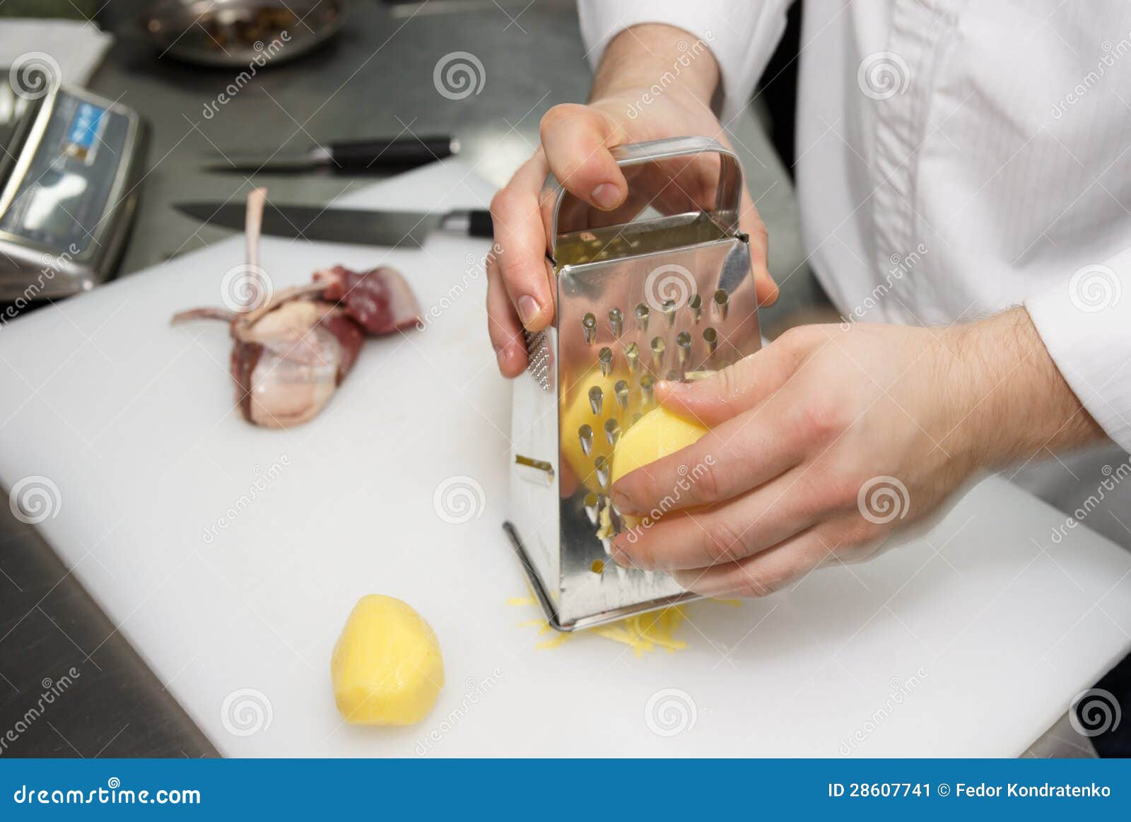 Chef is cooking potatoes stock image. Image of labor - 28607741