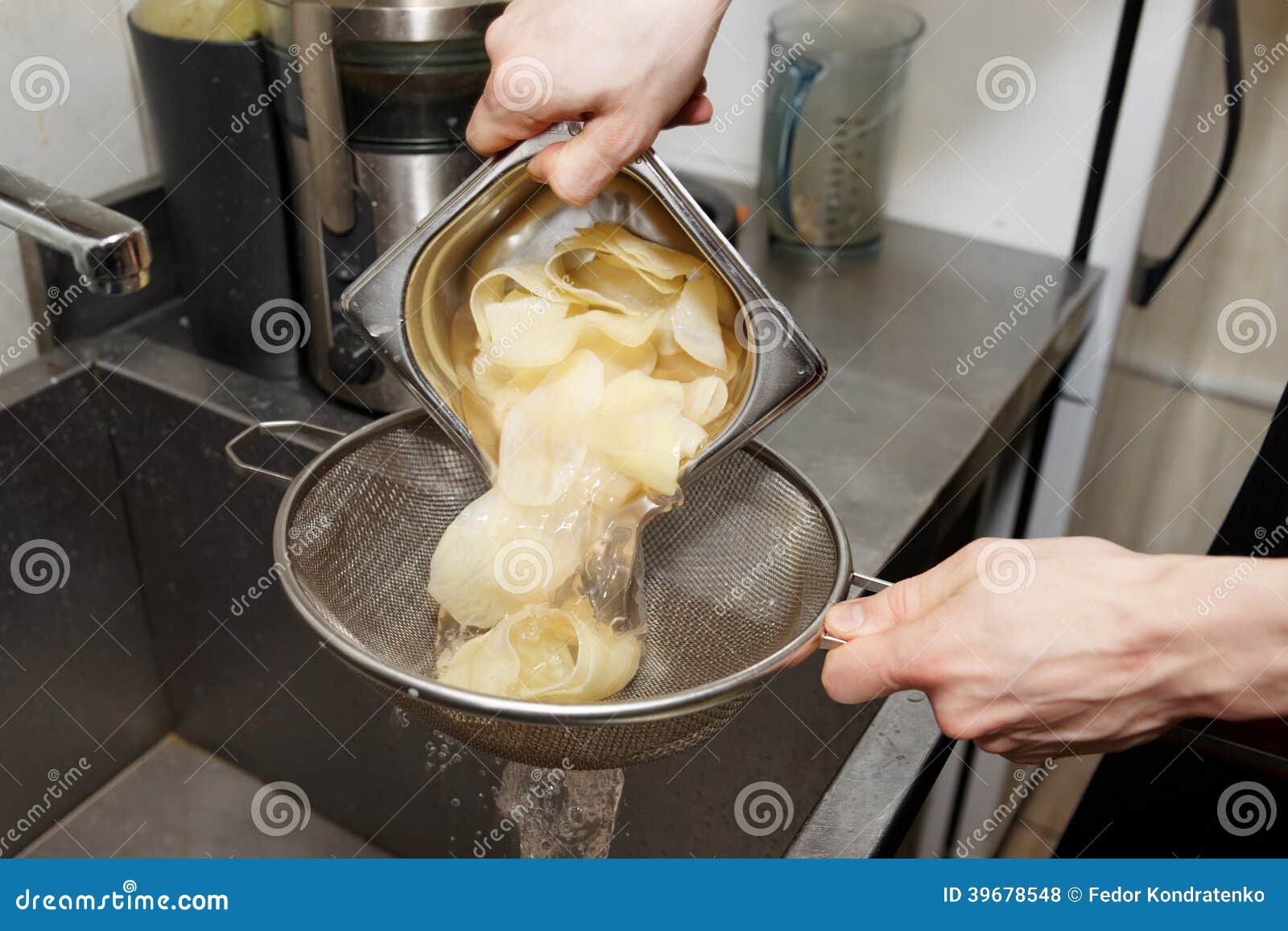 Chef is cooking potatoes stock photo. Image of plate - 39678548