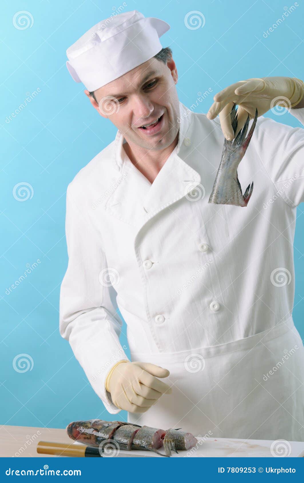 Chef cooking raw fish stock image. Image of vertical, place - 7809253