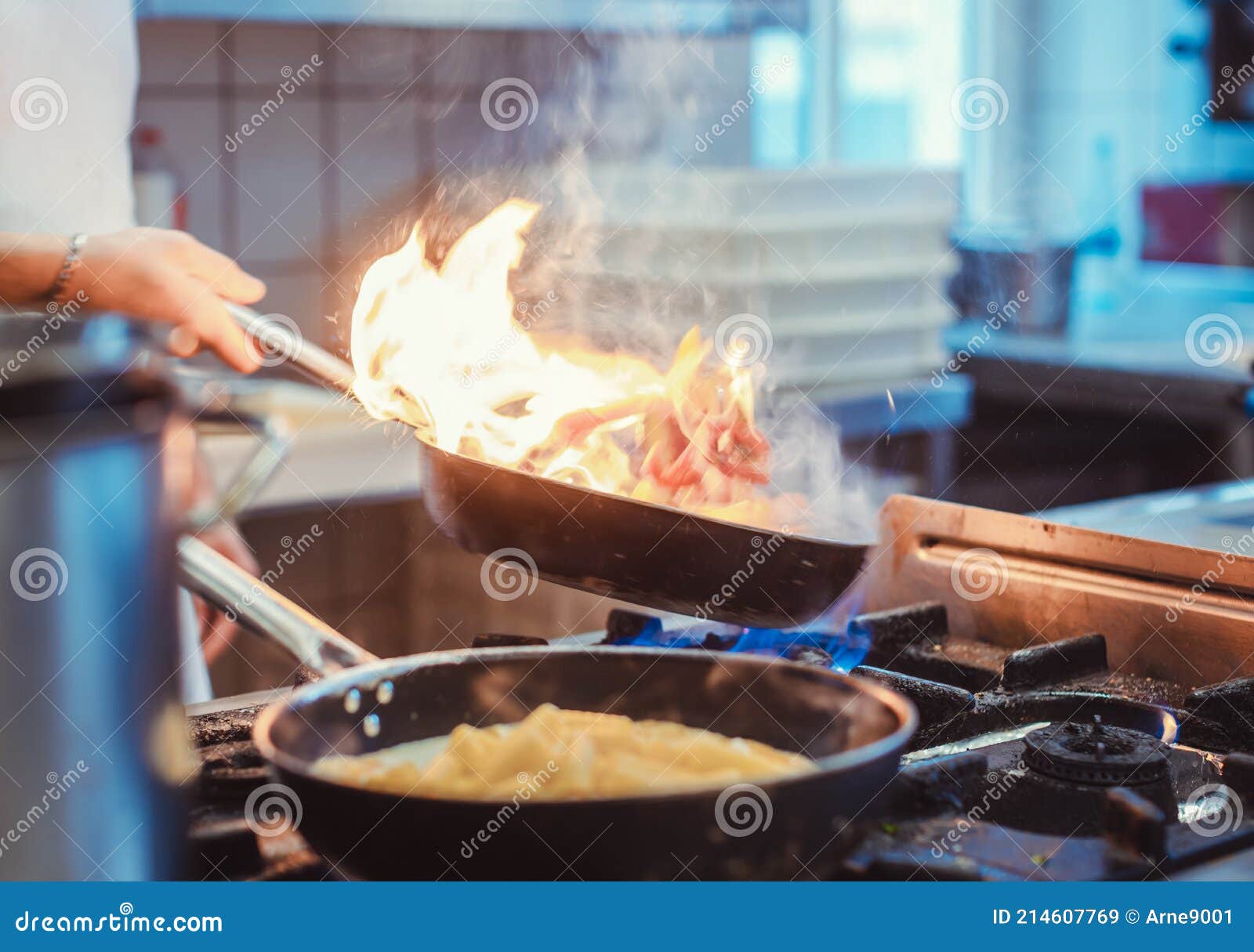 Chef Cooking in a Restaurant Kitchen Stock Image - Image of chef ...