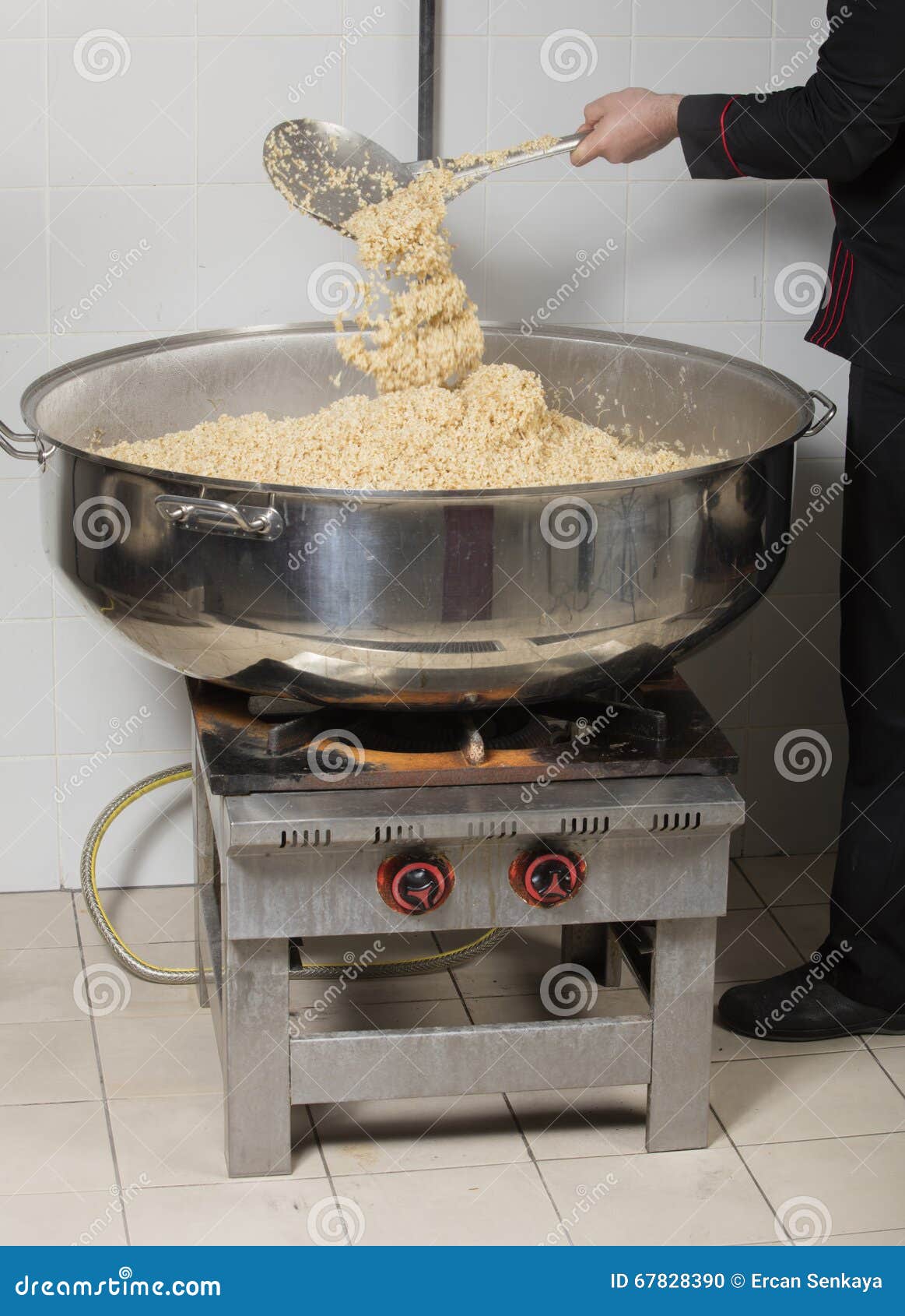 Chef Cooking Rice at a Commercial Kitchen Stock Photo - Image of metal ...
