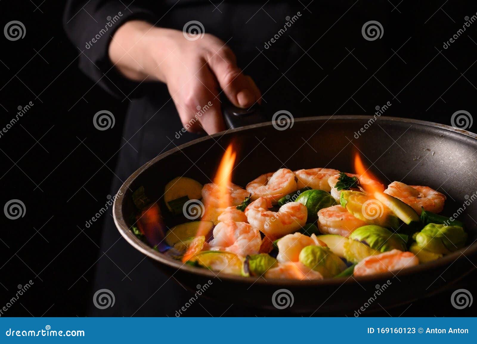 Chef Cooks Fish Using A Using Gas Burner Torch. Flambe Gun Pistol ...