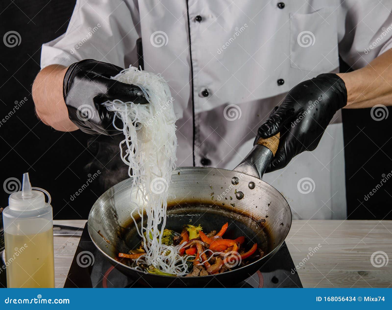 Chef cooks ramen in stages stock photo. Image of background - 168056434