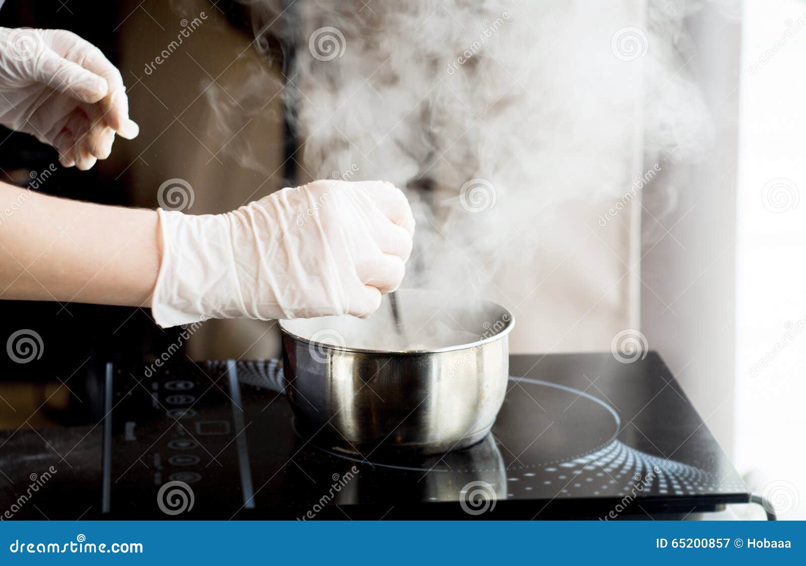 Chef Cooks Fish Using A Using Gas Burner Torch. Flambe Gun Pistol ...