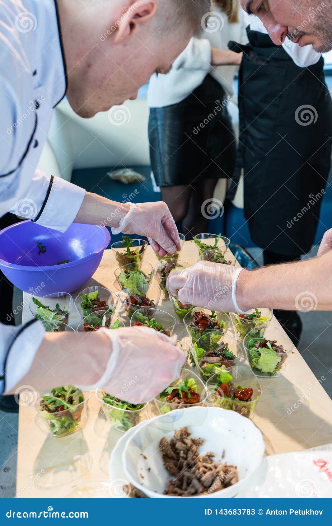 The Chef Covers the Table with a Variety of Snacks Stock Image - Image ...