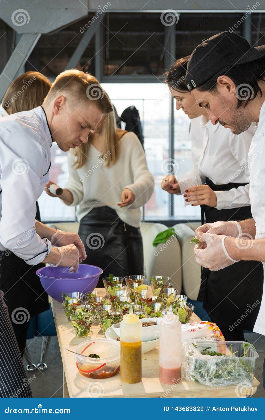 The Chef Covers the Table with a Variety of Snacks Stock Image - Image ...