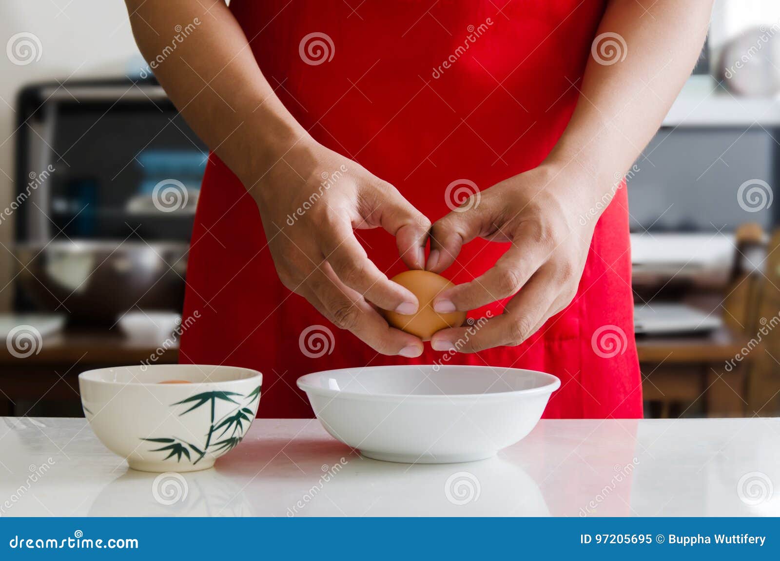 Chef Cracking Egg into a Bowl for Cooking Stock Image - Image of ...