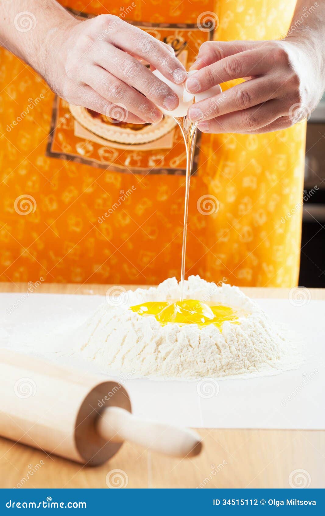 Chef Cracking Egg into Flour Stock Photo - Image of chef, hand: 34515112