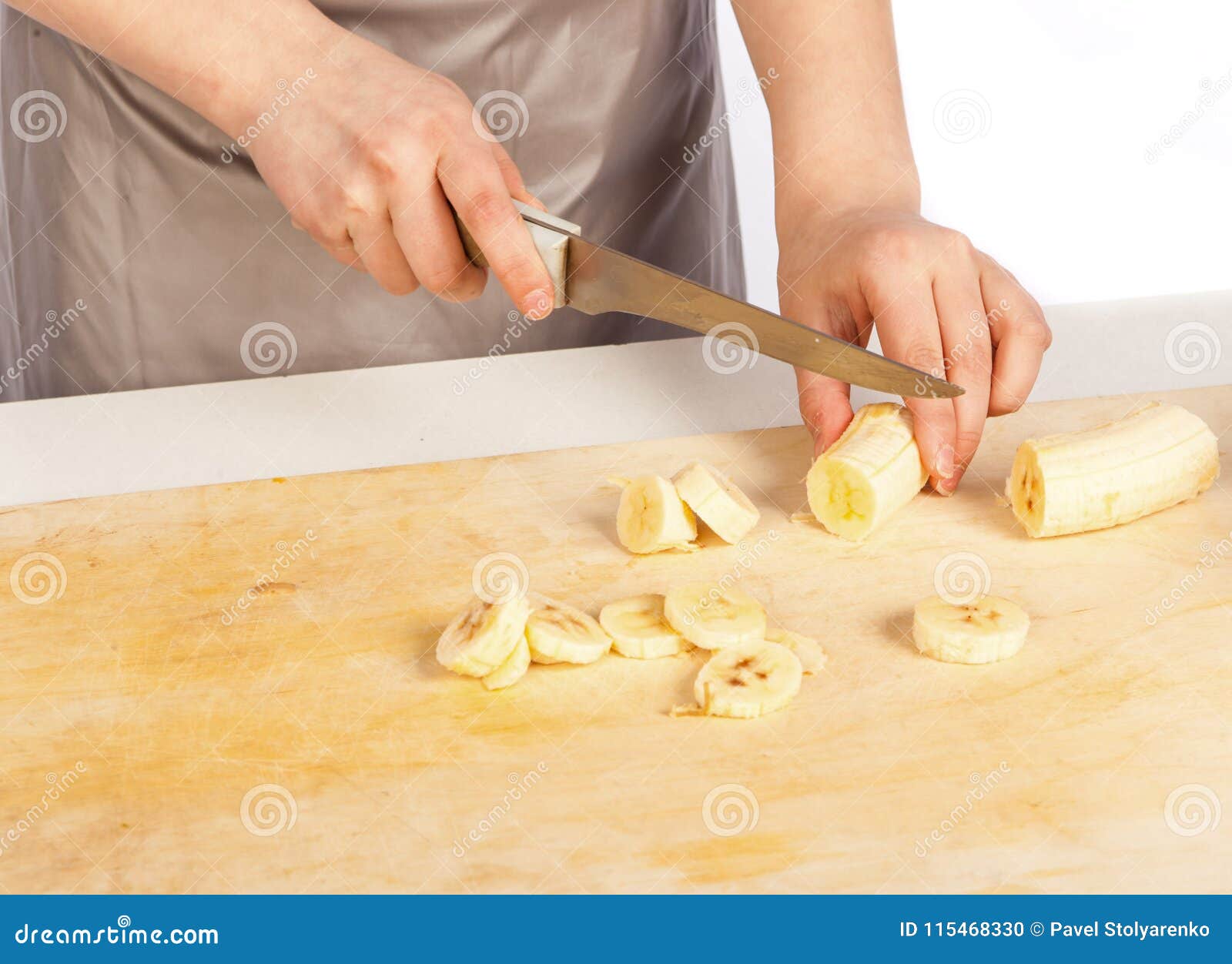 Chef cuts a banana stock photo. Image of banana, chef - 115468330