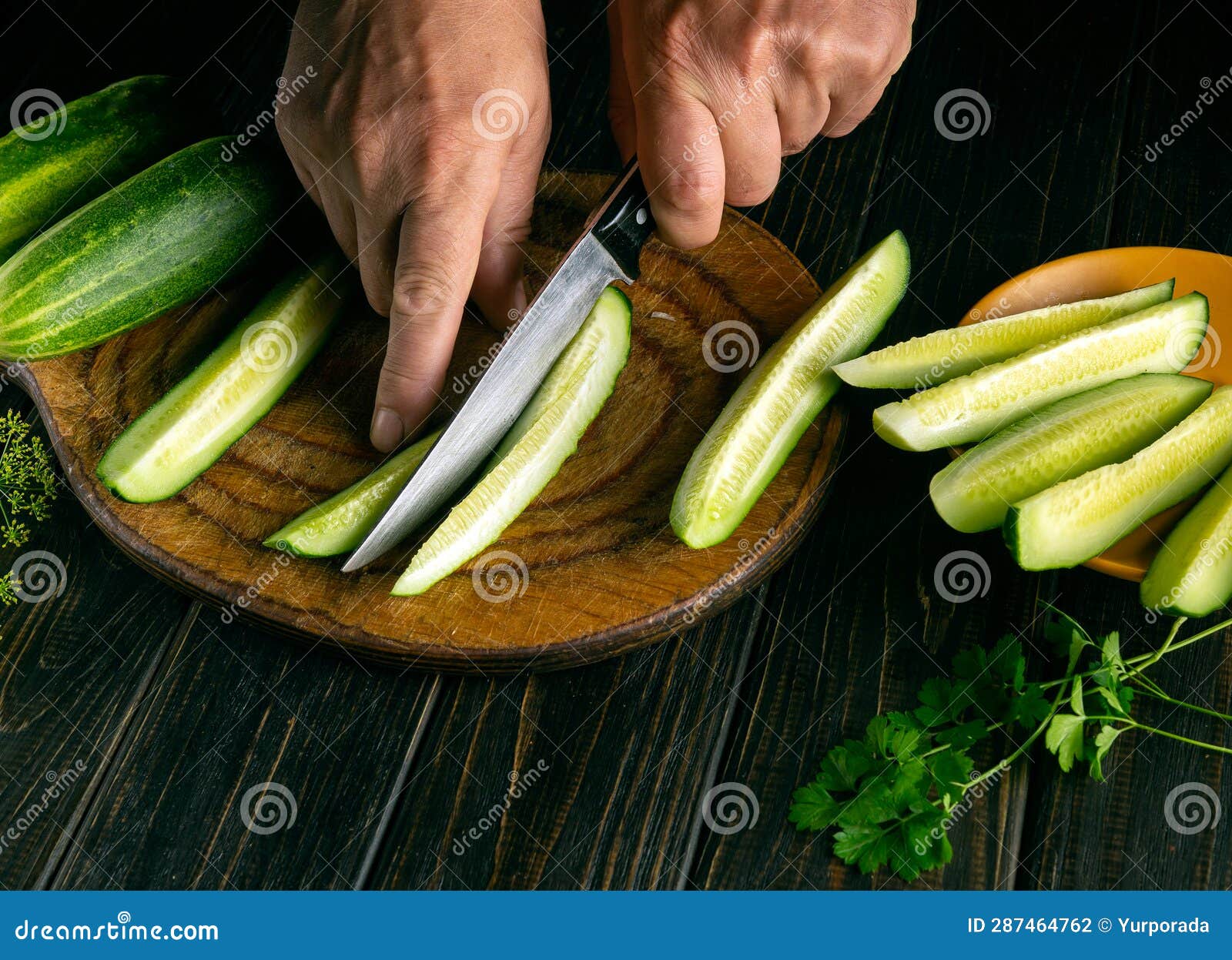 The Chef Cuts Cucumbers into Lengthwise Slices for Serving before ...
