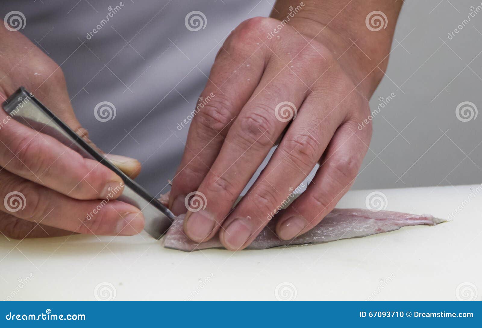 Chef Cuts the Fish into Pieces of Sushi Stock Photo - Image of cook ...