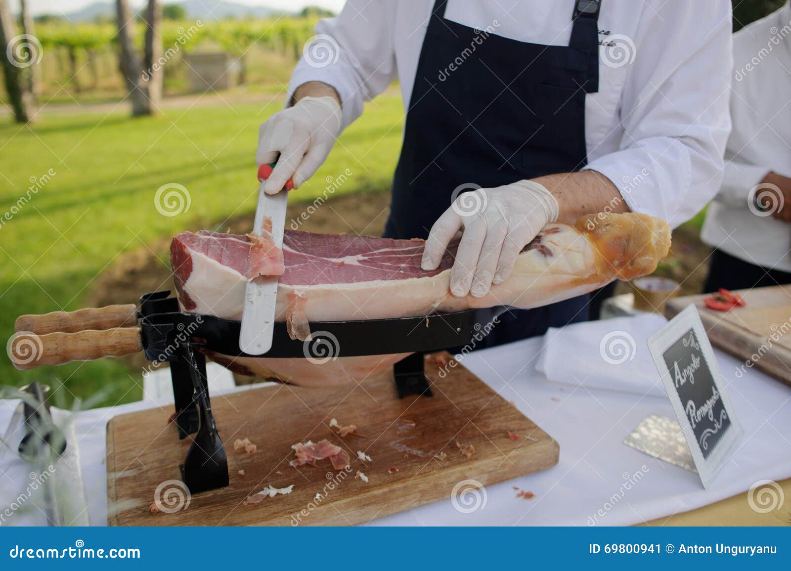 Chef cuts the hands ham stock image. Image of appetizer - 69800941