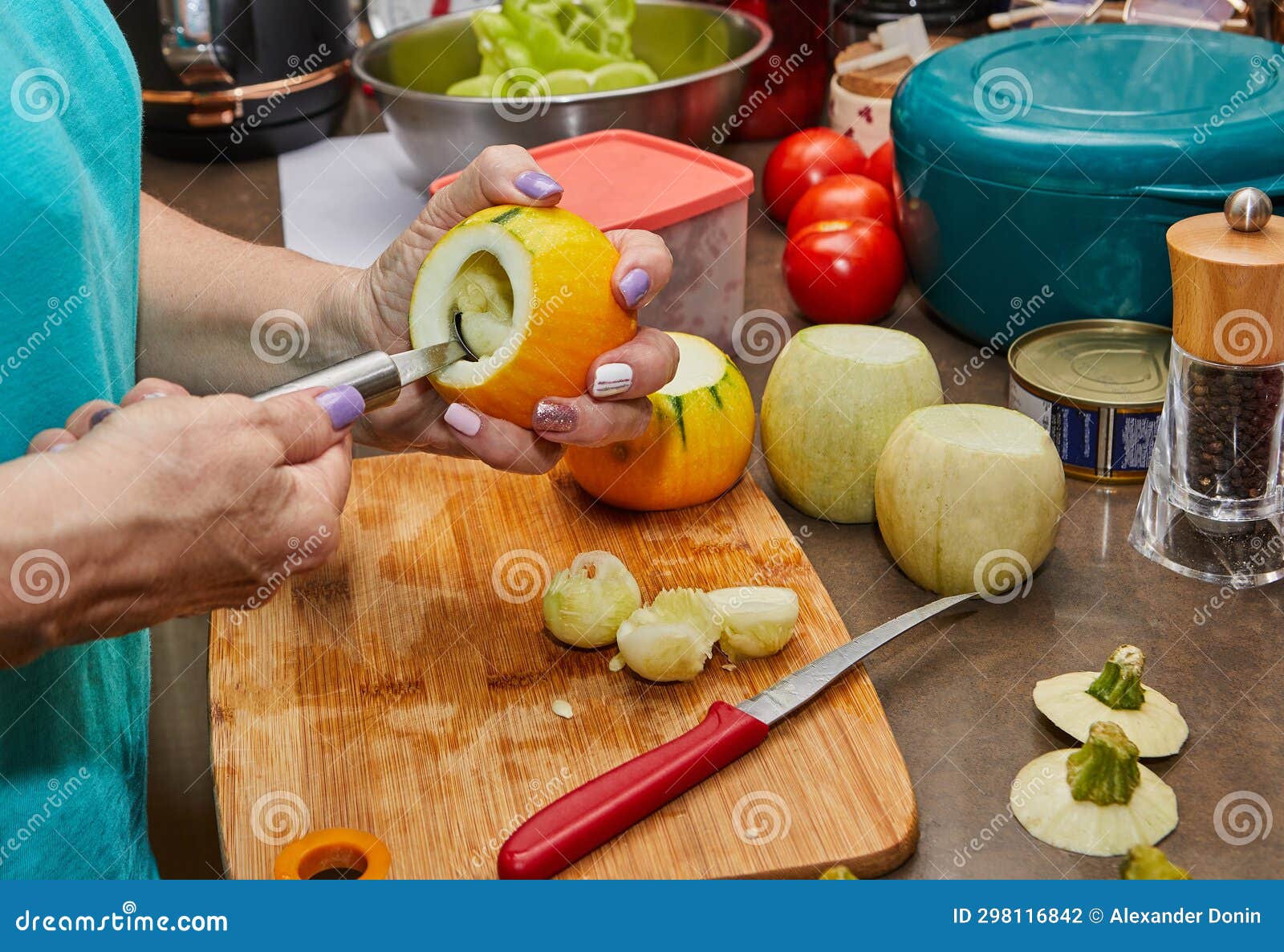 Chef Cuts Out the Inside of Zucchini for Stuffing in Home Kitchen Stock ...
