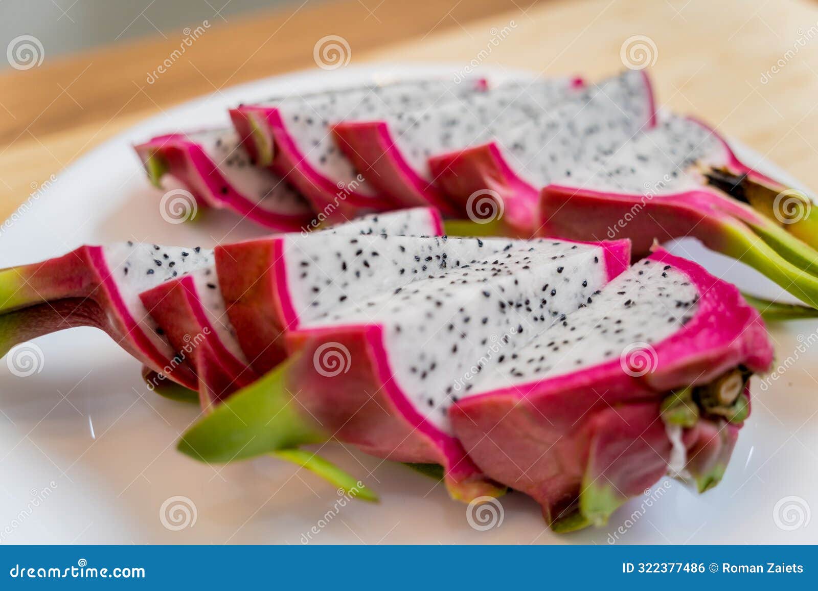 Chef Cuts and Peels Dragon Fruit on the Cutting Board Stock Photo ...