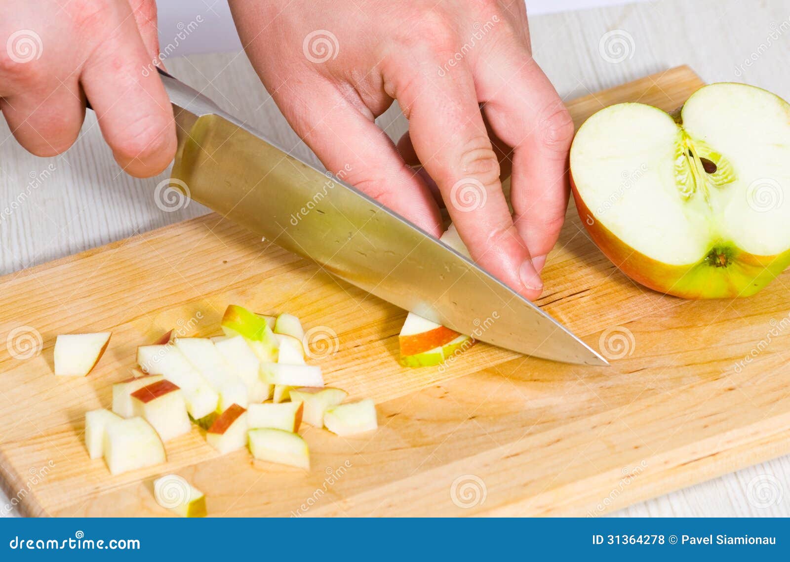 Chef cutting the apple stock photo. Image of apple, cook - 31364278