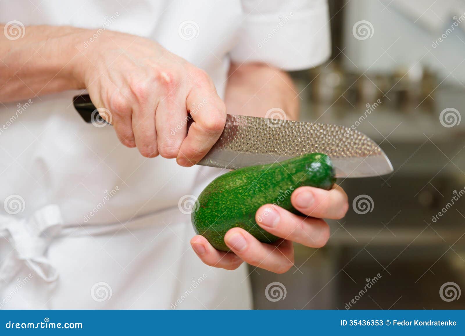 Chef is Cutting Avocado with Knife Stock Image - Image of fruit, hands ...