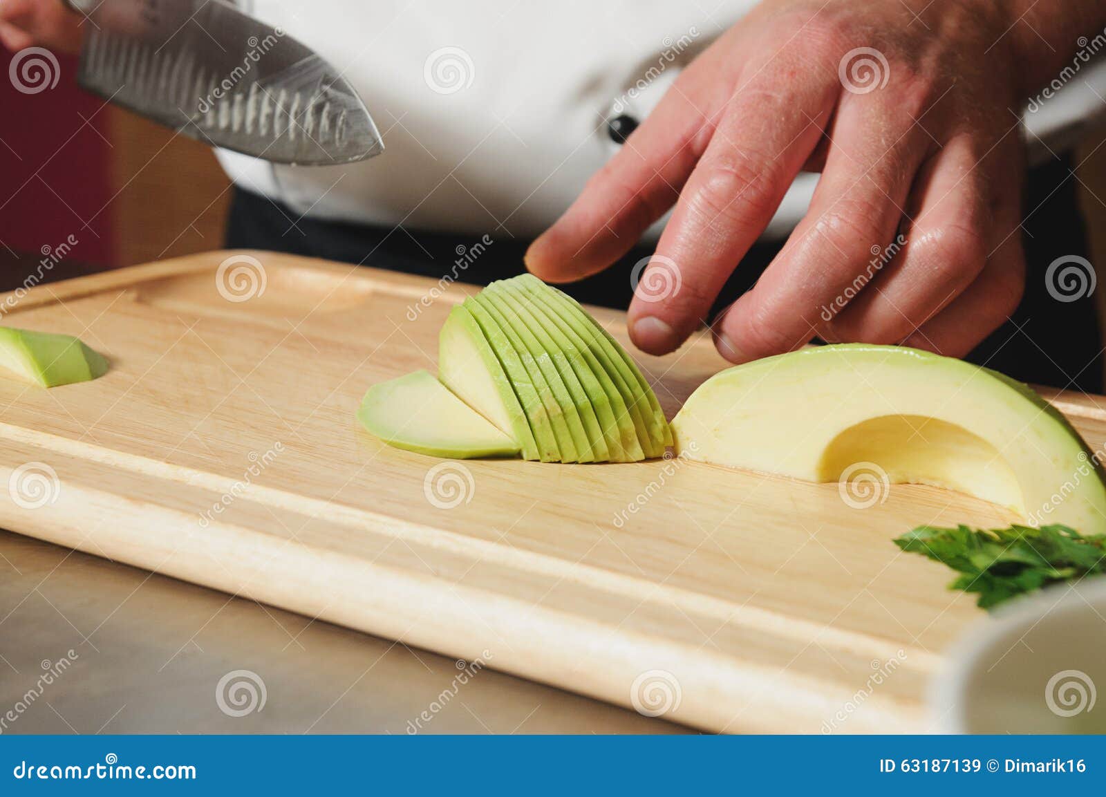 Chef Cutting Avocado on Table Stock Image - Image of fruit, yellow ... Chef Cutting Avocado on Table Stock Image - Image of fruit, yellow ...